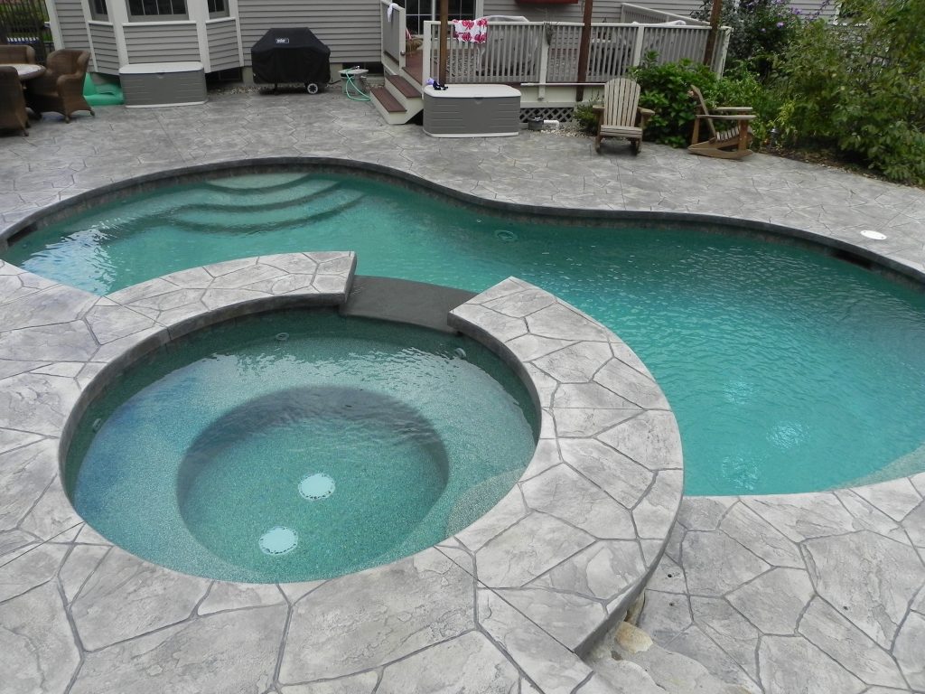 Home → Stamped Concrete vs. Regular Concrete: Pros, Cons, and More